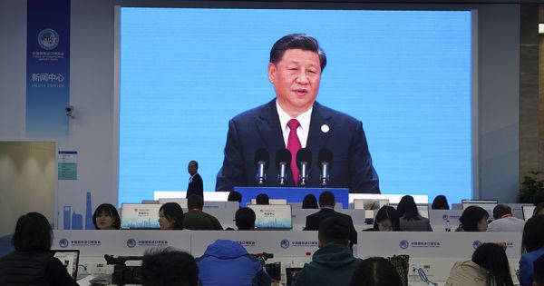 Xi calls on the world “to tear down the walls” of protectionism and ...